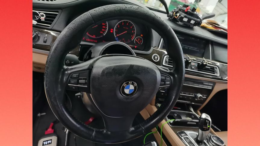 宝马转向角度传感器损坏,多功能方向盘按键不能正常使用