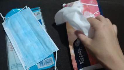 用过的口罩,能拿回家用消毒液洗过,100度热水泡过后能再用吗?