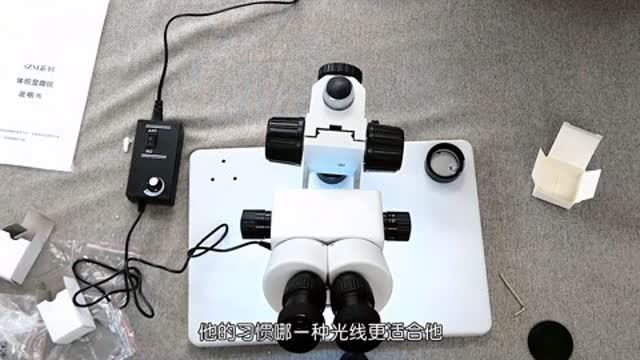 现在的手机维修不是从前了,都需要用到显微镜进行修理