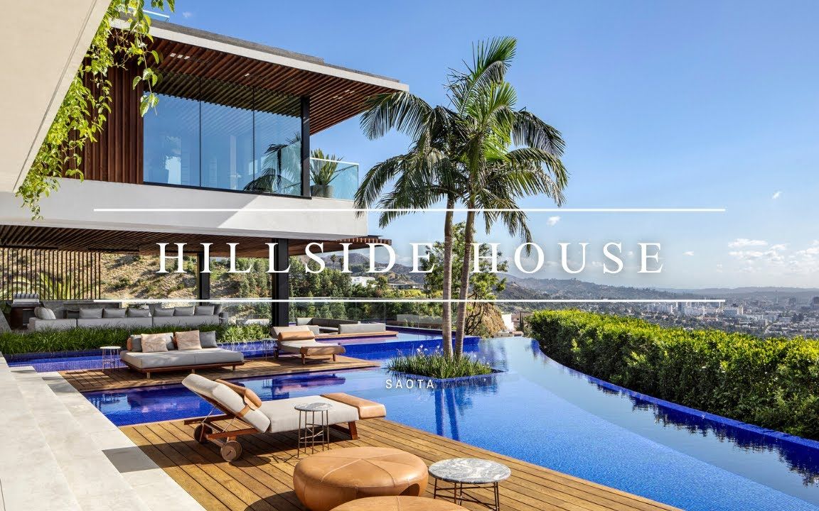 美学设计:日落大道上方山丘上的现代房屋设计