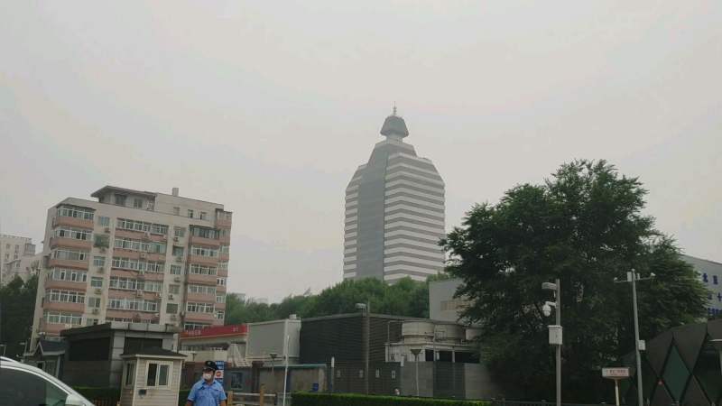 实拍新闻通讯机构,办公楼造型像一支笔,在宣武门西面