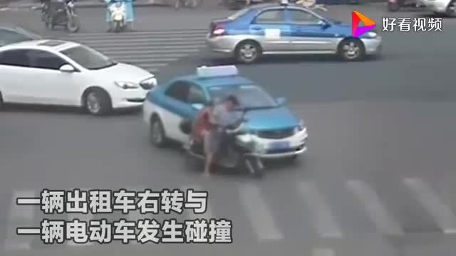 血的教训!实拍:电动车被剐蹭缓慢倒地 乘坐人头部着地意外死亡