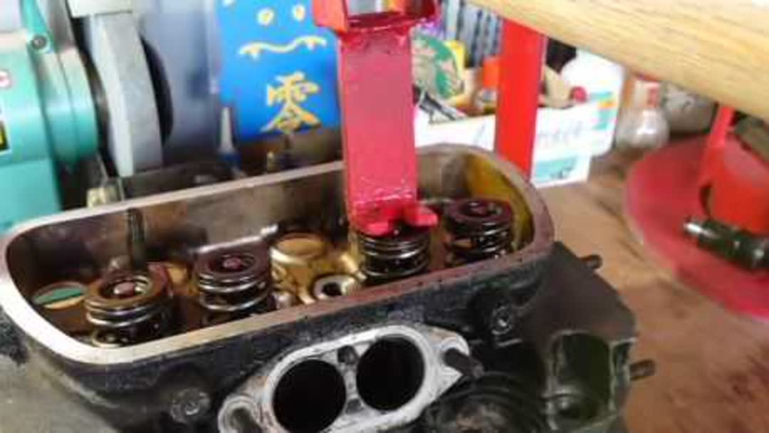 这种取发动机气门的方法不少人用过