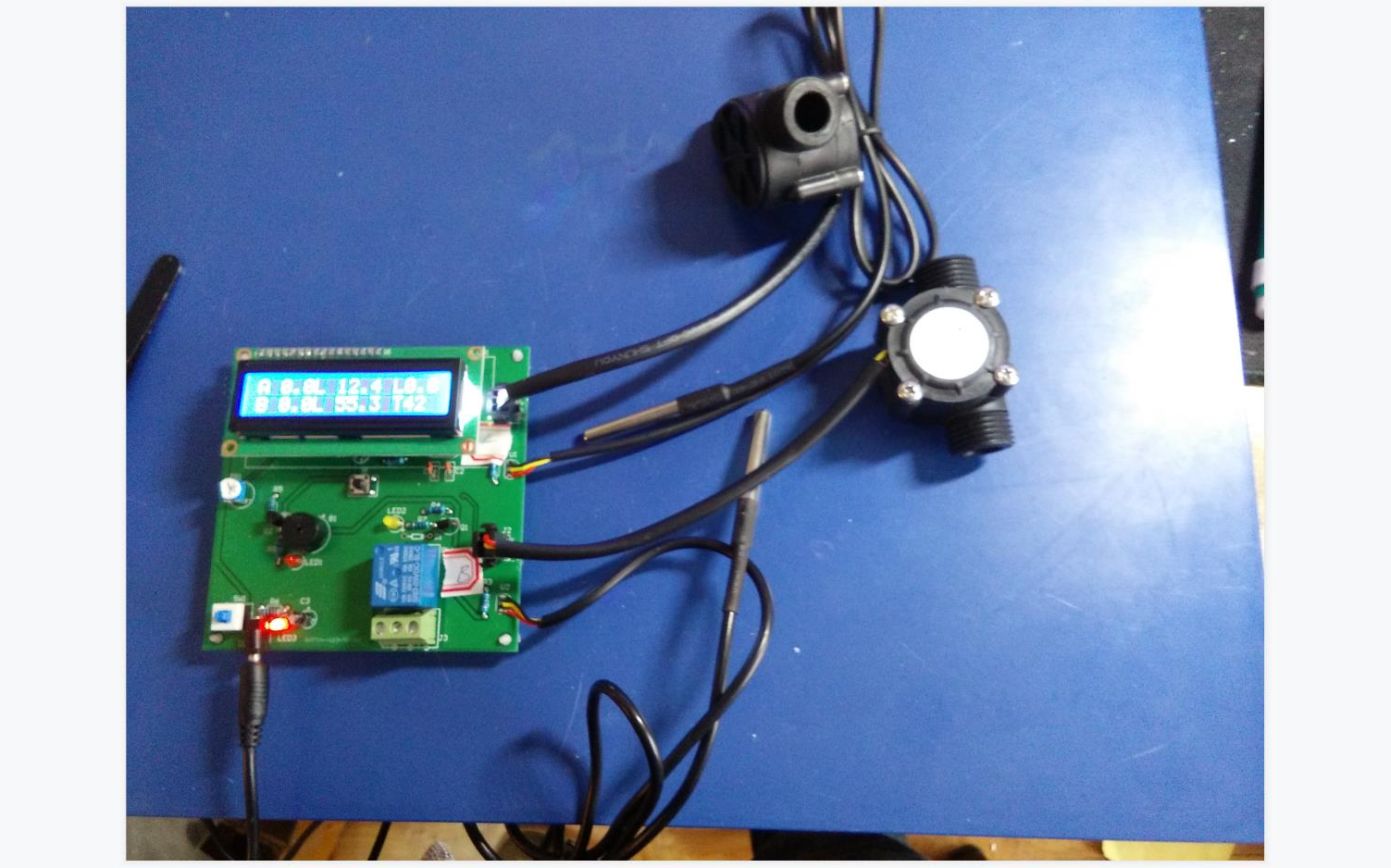 ...12C5A60S2单片机的水表煤气加油站油耗流量温度检测差值报警器...