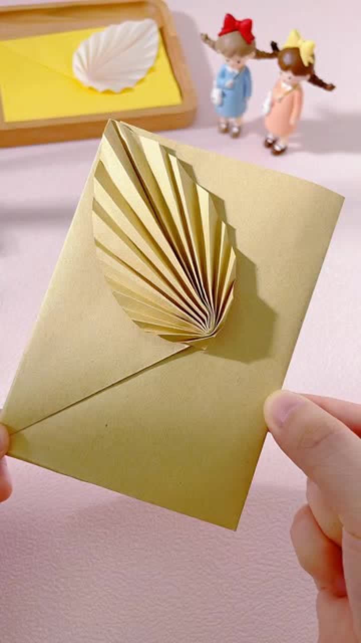 我想问一下这个相思叶信封是怎么装信的?儿时折过的相思叶.