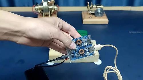 自制单缸发电机,加上稳压模块后就可以给手机充电了