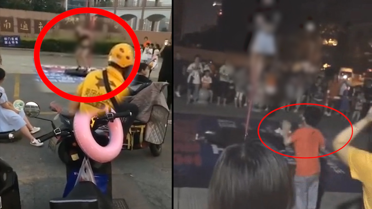 尴尬!女子中学校门口大跳钢管舞引来一小观众鼓掌,校方报警了
