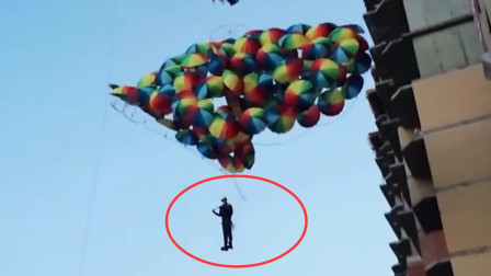 多少雨伞才能承受人的重量?老外"亲身"实验,勇气值得表扬