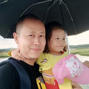 骑摩托的小裁缝 