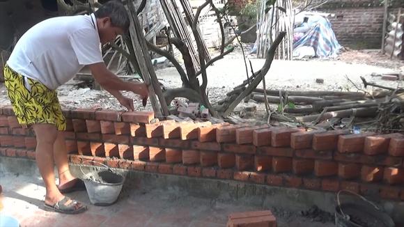 新式砌墙方法,农村瓦工师傅这样砌墙,省砖又美观