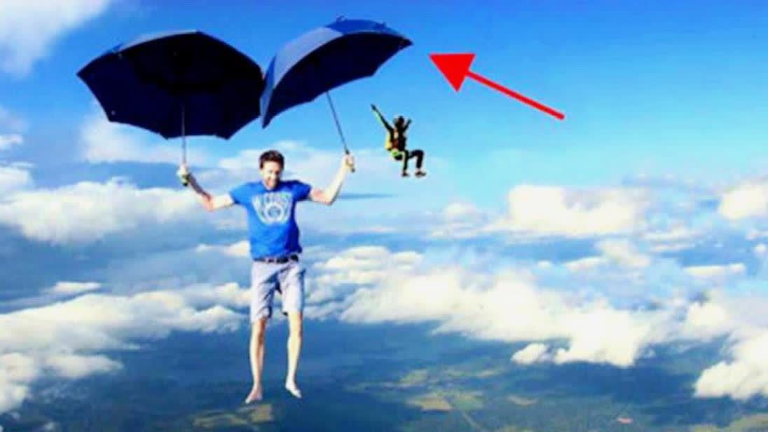 老外尝试拿雨伞当作降落伞,从空中跳下去,镜头记录全过程