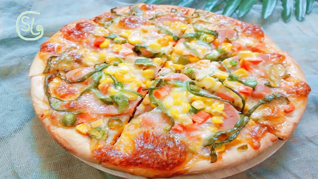 披萨自己在家做,10块钱就能搞定,松软拉丝,比买的好吃多了