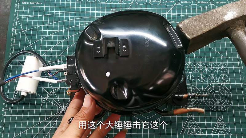 冰箱压缩机卡缸不启动,听说通电瞬间用大锤能修复,会不会成功?