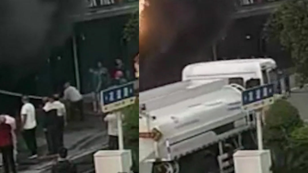 无锡一街边商铺起火,路过环卫工巧用洒水车灭火获见义勇为嘉奖