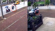 飞来横祸?小车行驶过程中轮胎脱落,滚向路边砸中无辜轿车