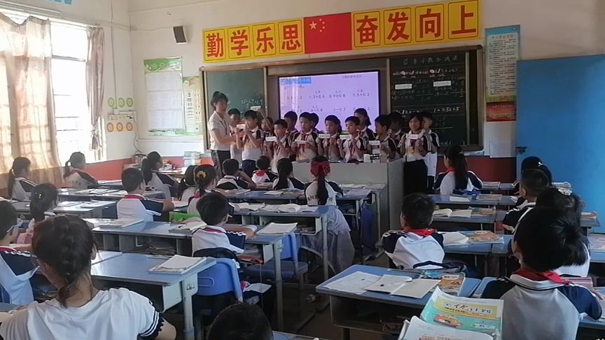 朝阳实验学校三年级数学课片断:简单的小数加减法