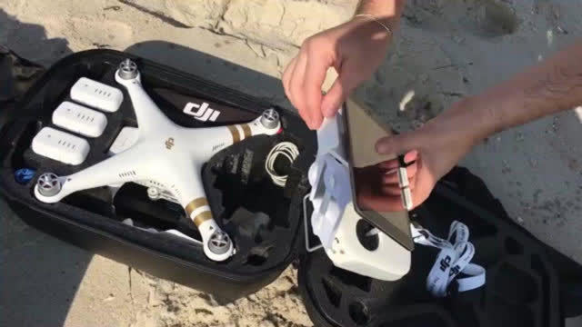 国外玩家开发出大疆无人机的新用法,可以用它来钓鱼