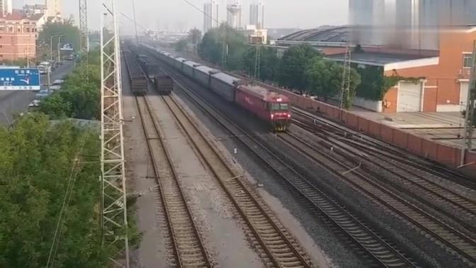 铁路实拍,烟台-佳木斯的K1393次列车,通过天津站4号楼