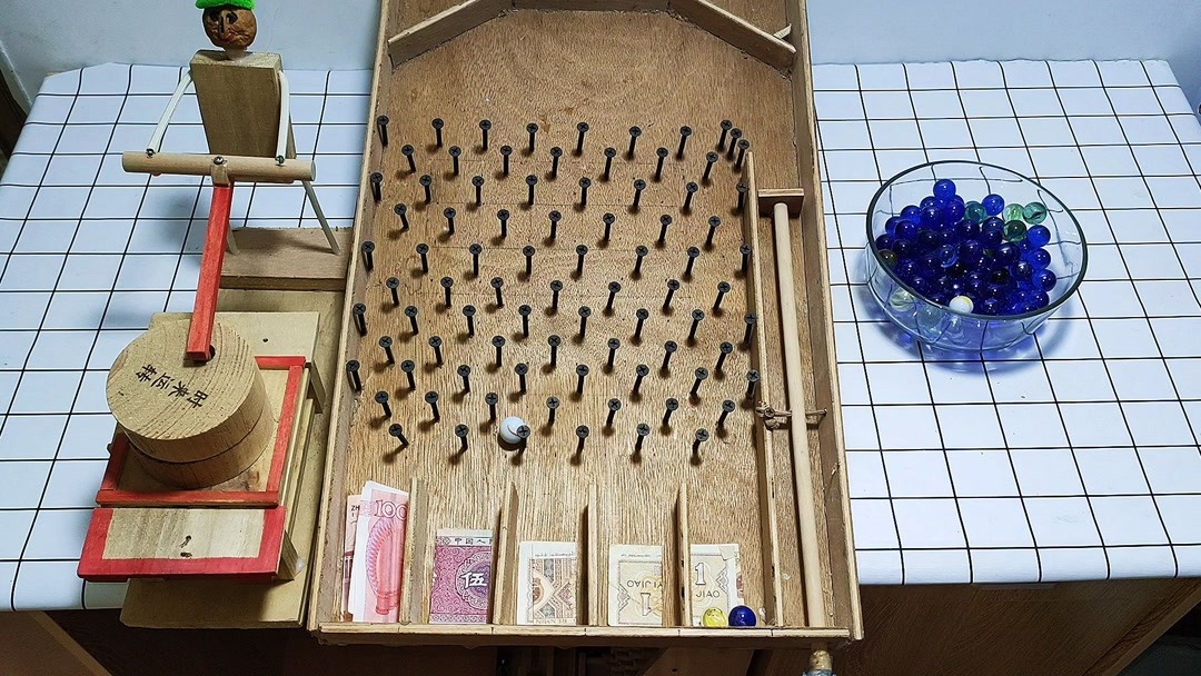 滚珠游戏,童年滚珠中奖游戏乐趣