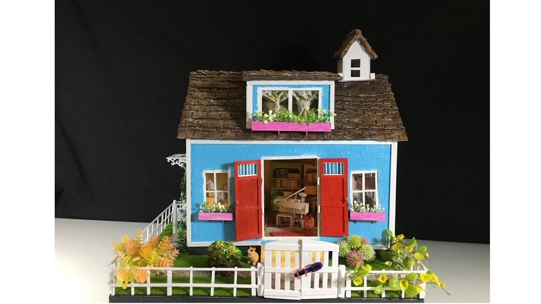 如何用纸板和粘土建造精致的小房子