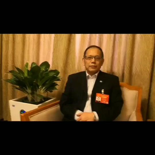 ...代表、航空工业特飞所高级主任设计师张金华在参加完全国人大会...