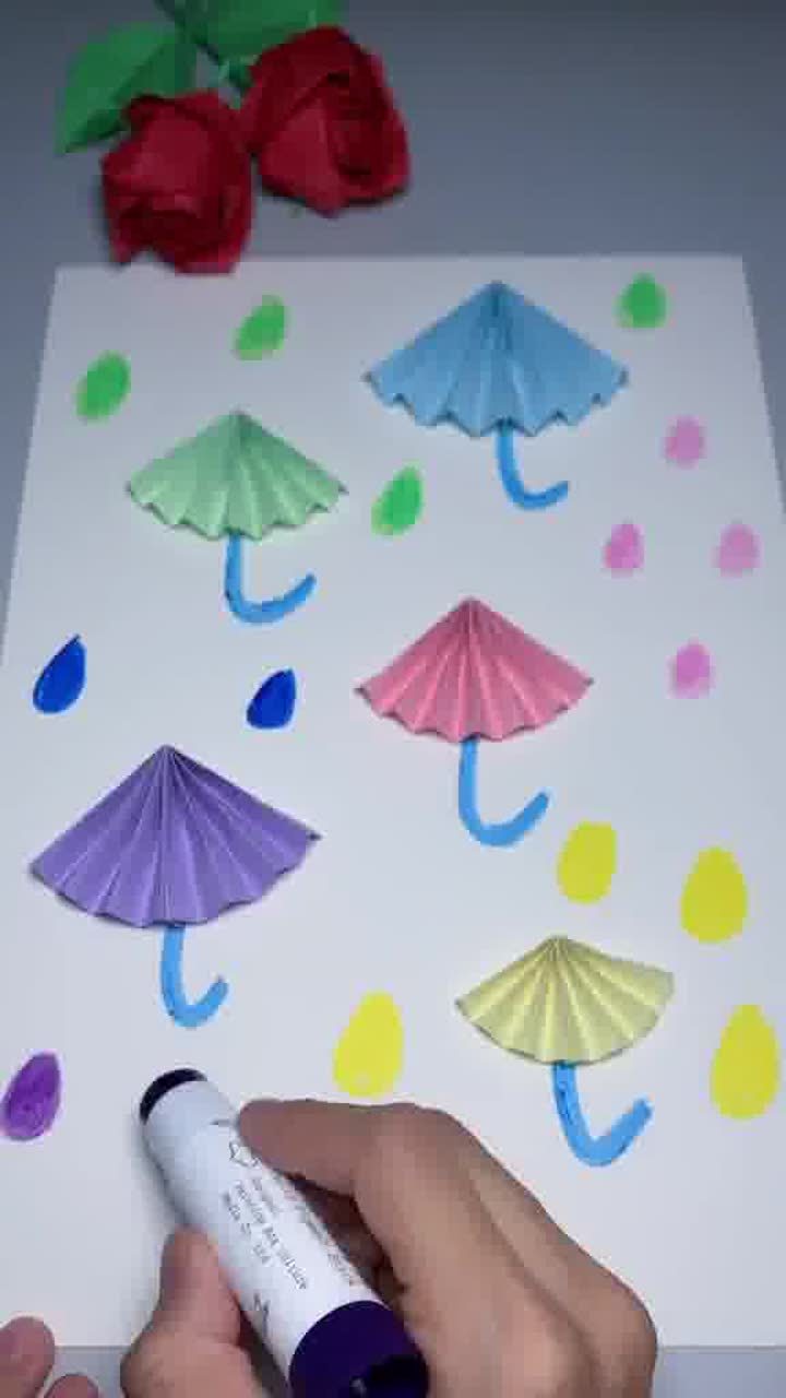 天天都是下雨天,做一幅简单的彩色雨伞手工画吧!