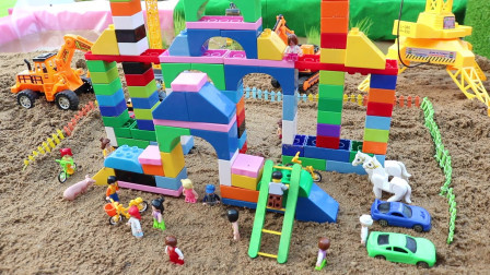 用积木在沙滩上建一座城堡