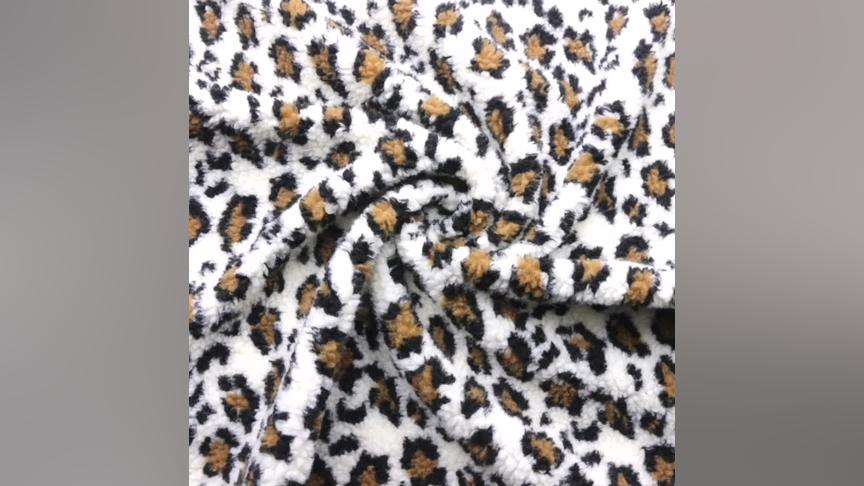 色织提花羊羔毛绒布全涤仿毛皮加厚颗粒泰迪绒豹纹提花羊羔绒布料