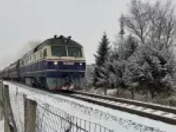 雪后的长图线,“延边之星”K215次旅客列车驶出延吉站