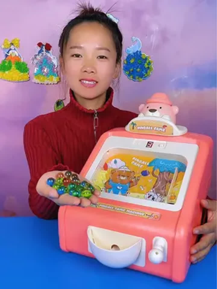 好玩的弹珠游戏机,我赢了好多珠子 #弹珠机 #趣味游戏#这个太好玩了