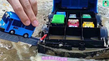 救援车把小汽车们都救了上来