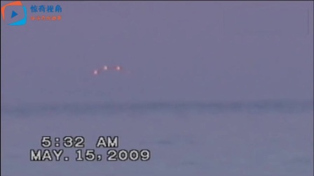 国外男子用天文望远设备拍到远处画面中的UFO不明飞行物