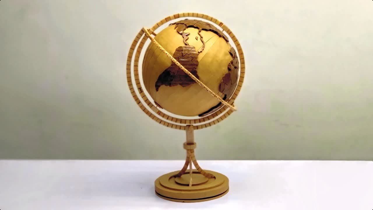 太有才啦,小哥用硬纸板和冰棒棍制作立体地球仪,看着真不错