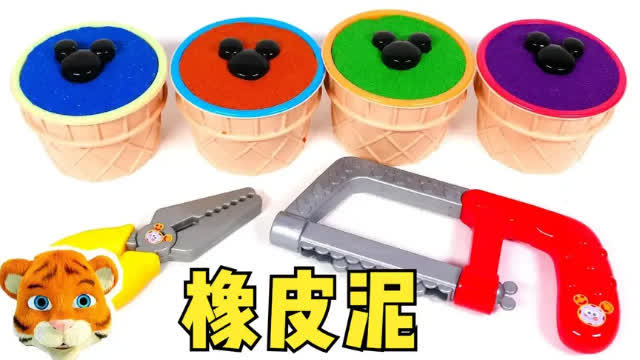 一起玩彩色橡皮泥,用模具压出各种小动物