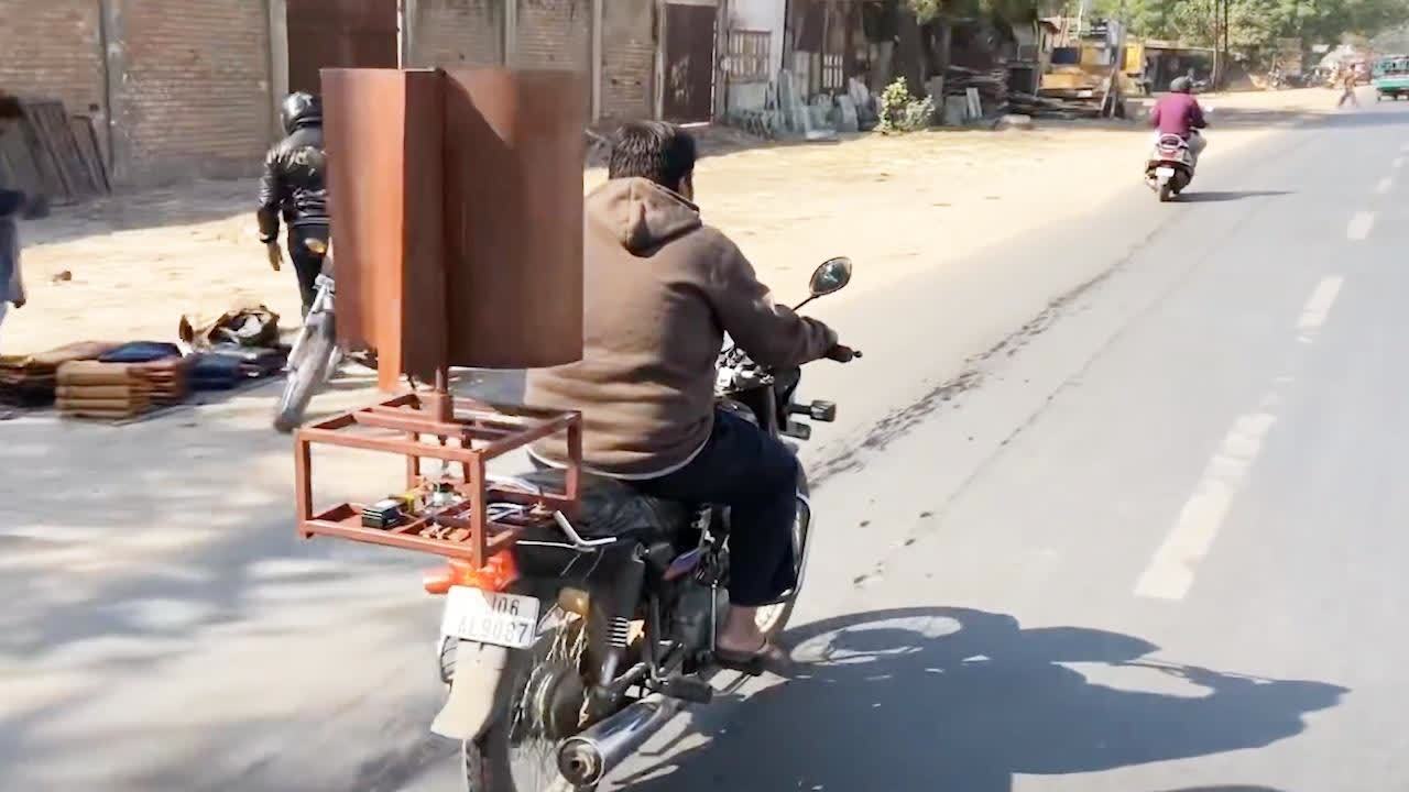 牛人自制风力发电机,烧油比发电还多,200元造一台