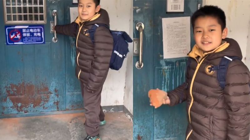 男孩拿着板砖当门禁卡开门,往感应区一拍轻松解锁,身后妈妈傻眼