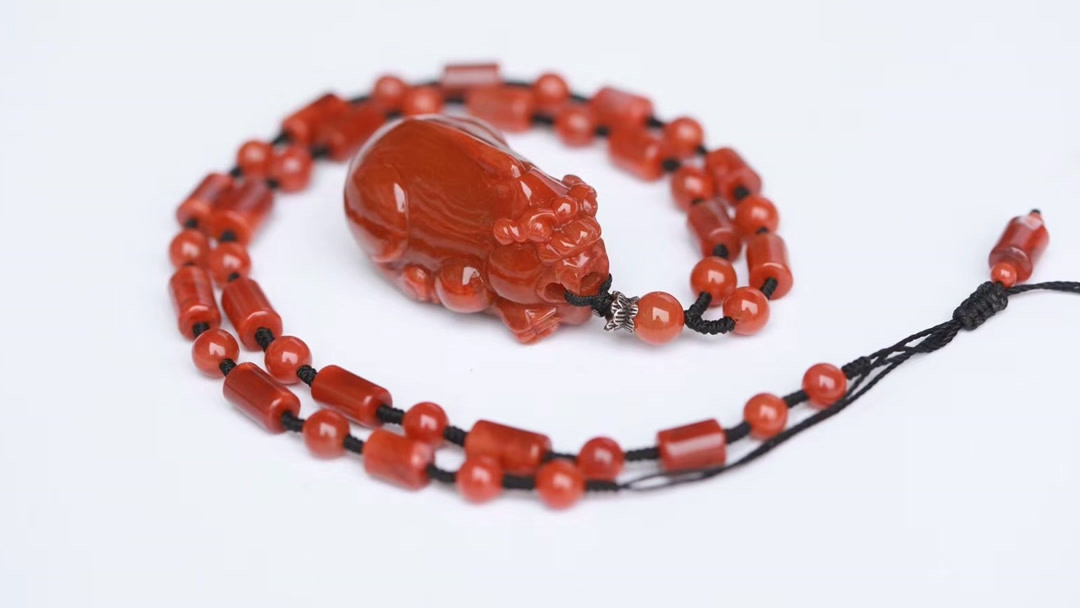 注胶南红算不算假货?这种南红还值钱吗?