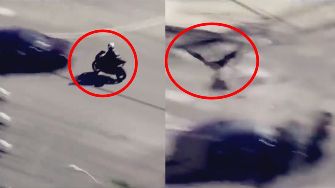 实拍:美国一摩托车手时速200公里躲警察 突然撞车甩飞100米身亡