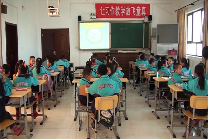 ...人教版一年级数学上册《7.认识钟表》-滕老师优质课公开课教学视频
