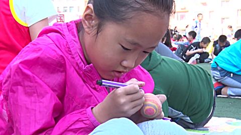 东胜小学教育集团“迎端午 话传统 包粽子 画彩蛋”主题教育活动