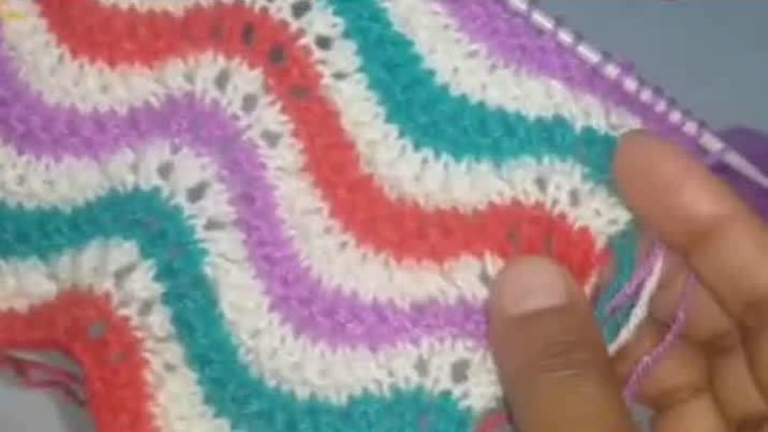 手工毛衣编织教程:棒针编织七彩凤尾花花样,织背心特漂亮!
