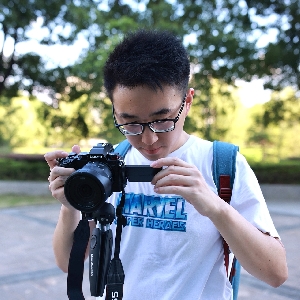 小陈只会按快门 