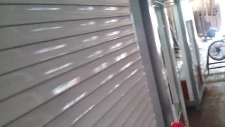 手动扭簧卷帘门安装方法