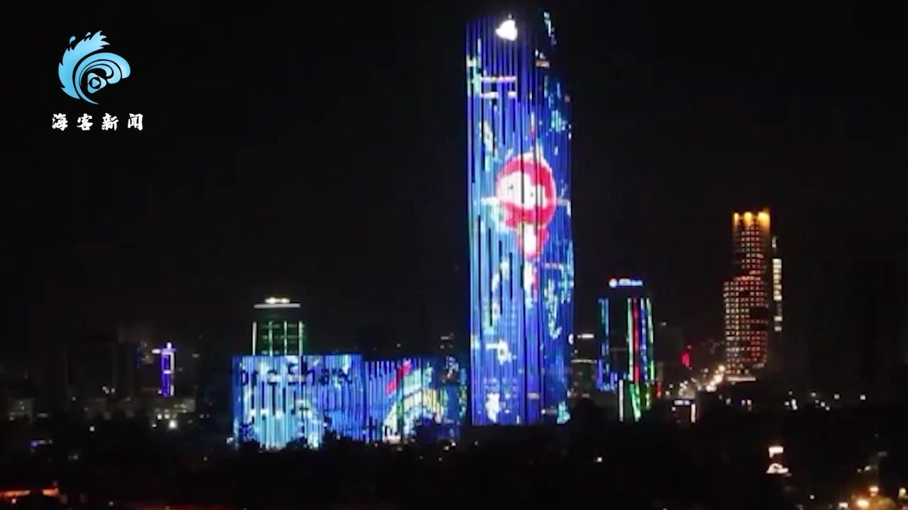 冰墩墩和雪容融萌降东非高原 地标建筑上演灯光秀为冬奥助威