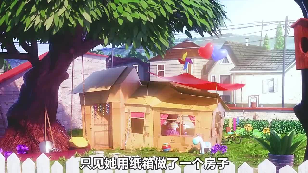 女孩用一个纸箱做了一个房子