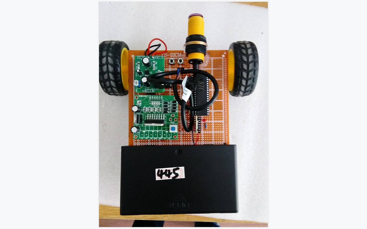 基于51单片机的儿童音乐动感玩具小汽车智能车设计-L298N-E18-蓝牙...