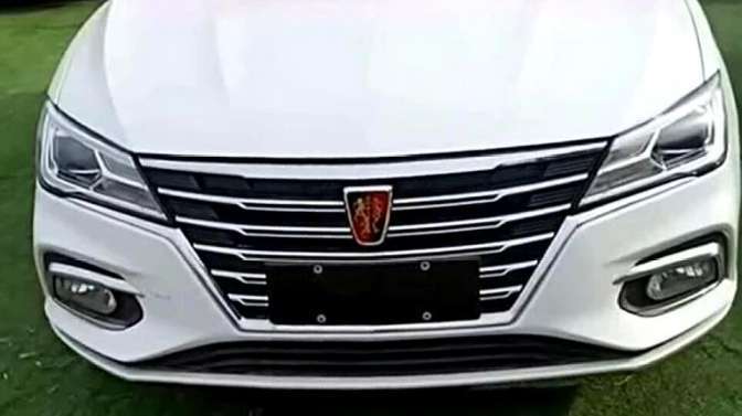 荣威i5买到手了,坐进车内看完中控,真是爱不.