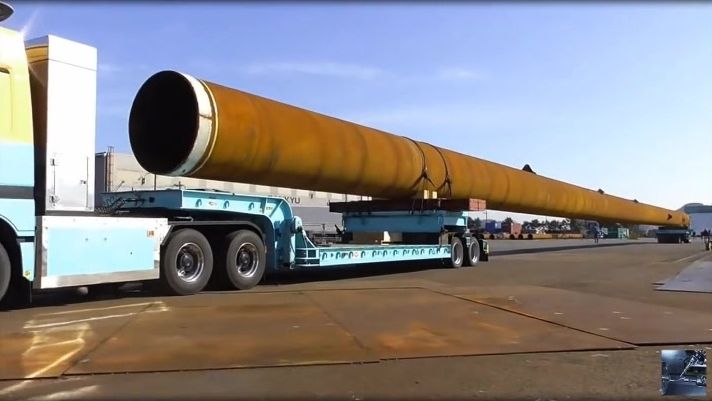 巨型钢管桩的运输与安装过程跟拍,实在是太霸气了