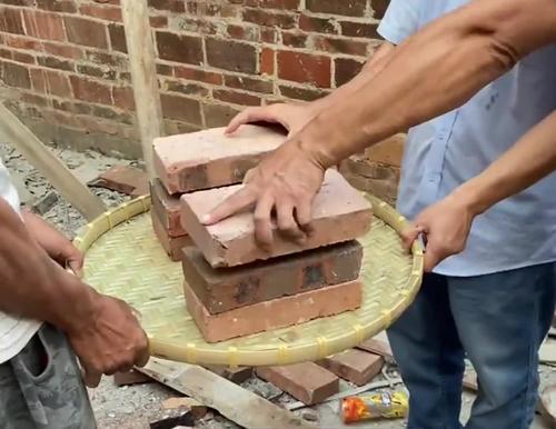 竹编簸箕农家,承重试验