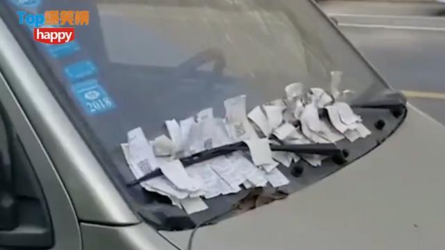 搞笑:一个月没回家,车子被贴了这么多罚单